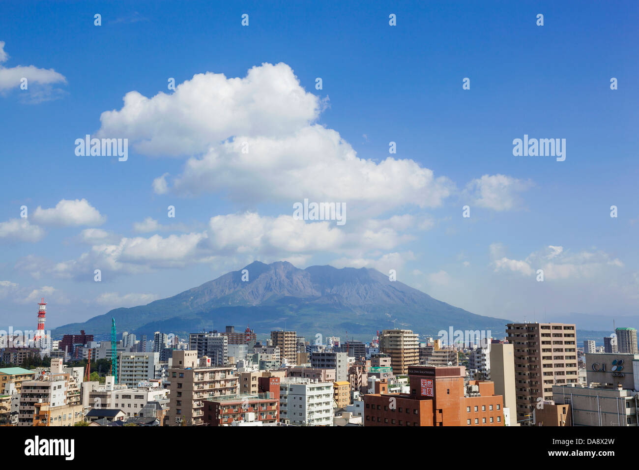 Japan, Kyushu, Kagoshima, Kagoshima City Skyline and Sakurajima Volcano ...