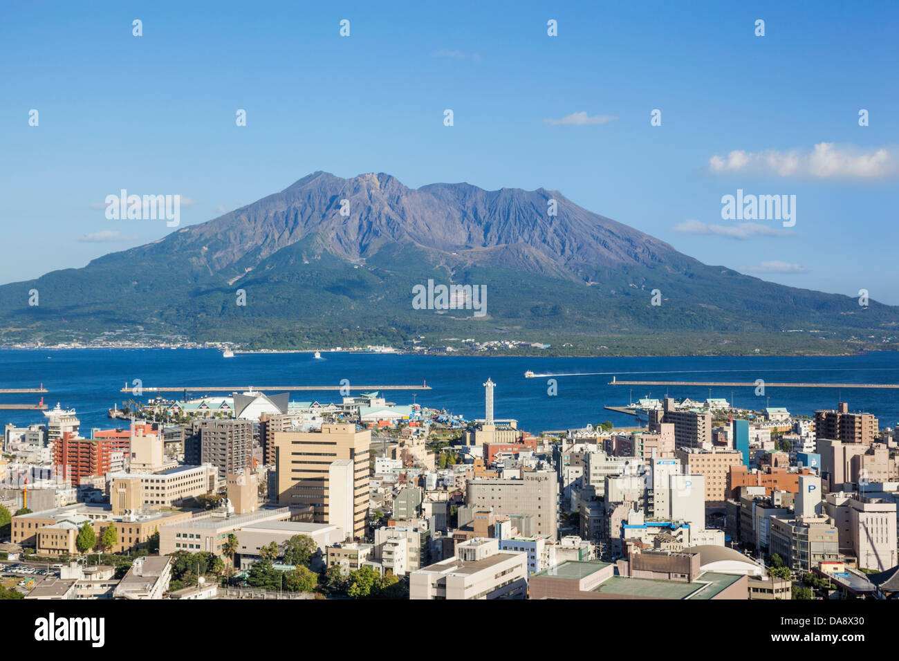 Japan, Kyushu, Kagoshima, Kagoshima City Skyline and Sakurajima Volcano ...