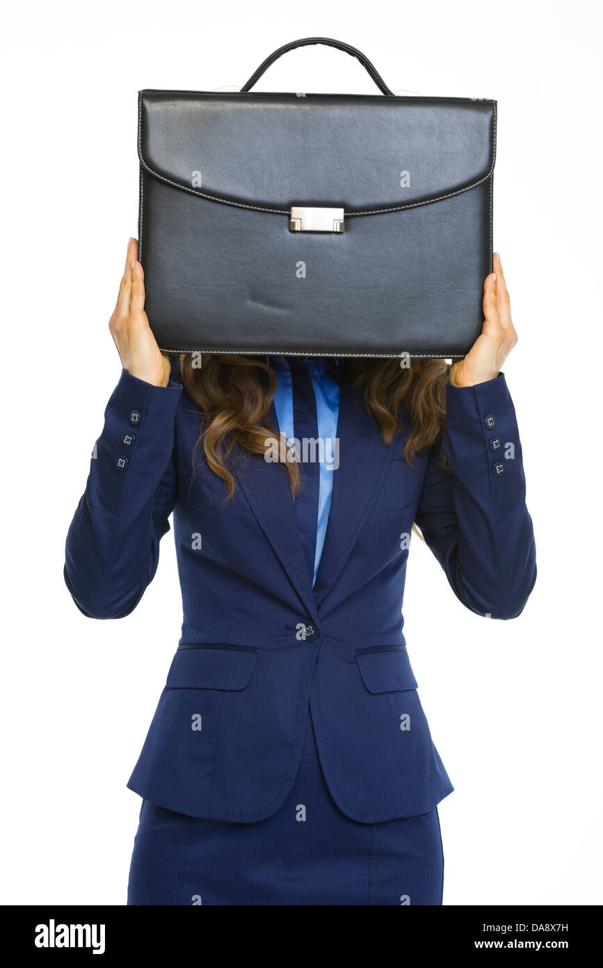 Business woman holding briefcase in front of face Stock Photo - Alamy