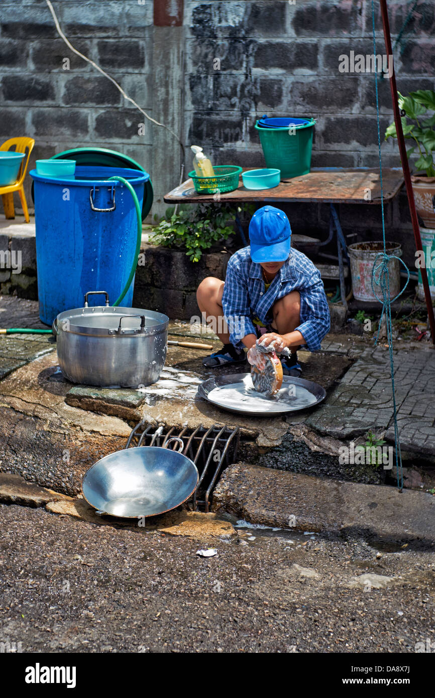 Washing pots hi-res stock photography and images - Alamy