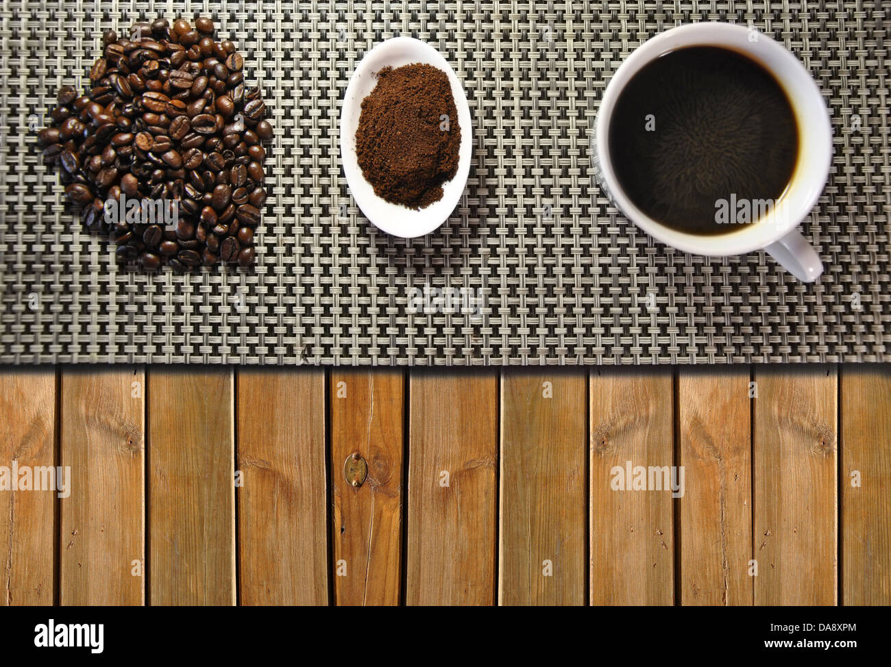 three types of coffee, one bean, one ground and one in cup Stock Photo ...