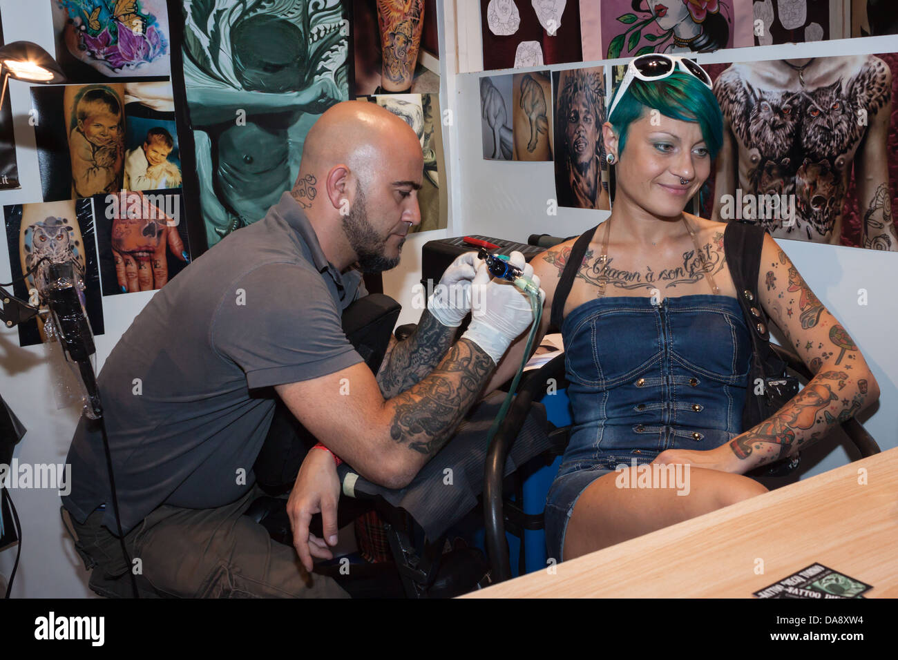 Milan, Italy - July 6, 2013: People take part in Tatuami, important event dedicated to the world ...
