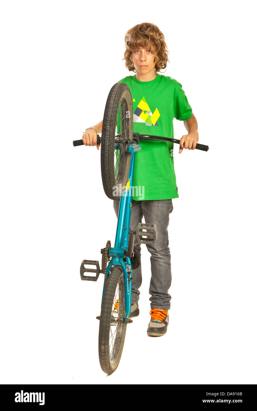 Freestyle teen biker raising bike isolated on white background Stock ...