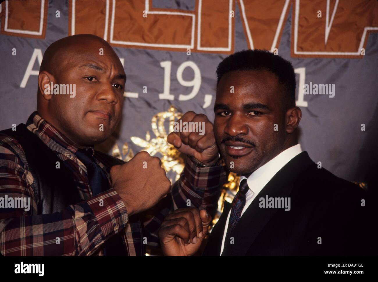 EVANDER HOLYFIELD with George Foreman.Press Conference at Grand Hyatt ...