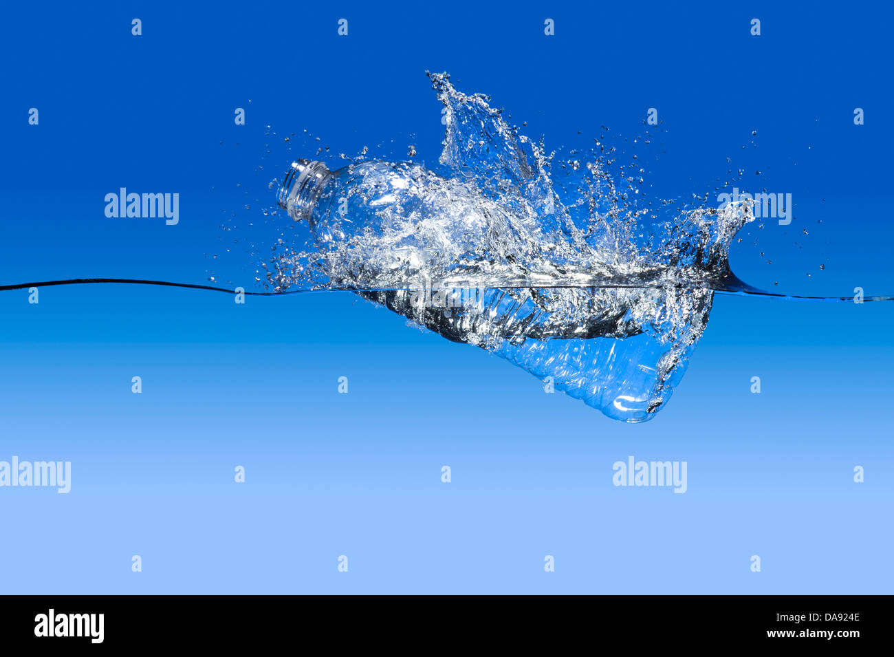 A Water Bottle Splashing In To Water Stock Photo - Alamy