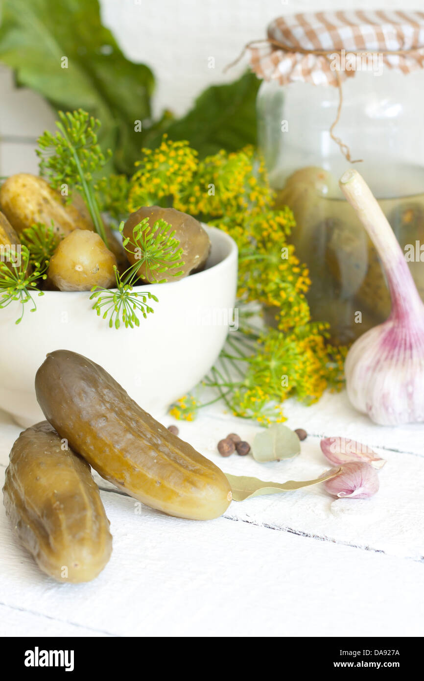 Pickles gherkins salted cucumbers still life on old planks Stock Photo ...