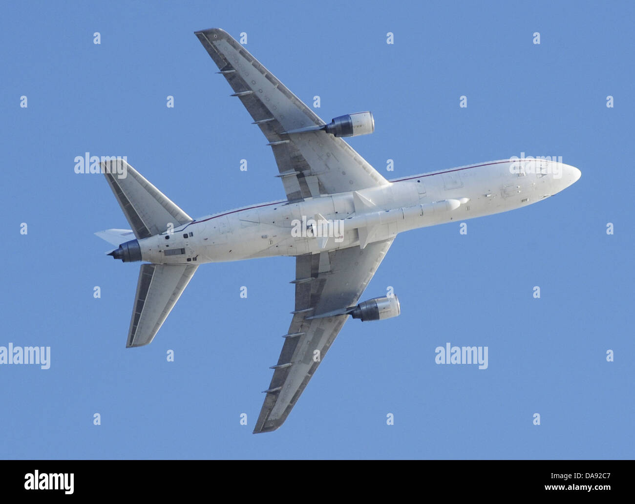 An aircraft carrying the IRIS Solar Observatory takes off for its ...