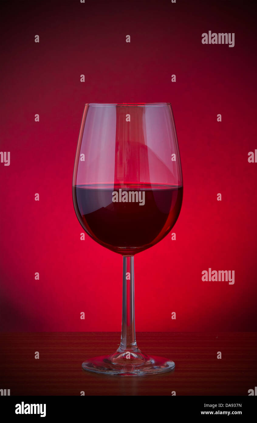 Low key vignette image of red wine in a glass Stock Photo - Alamy