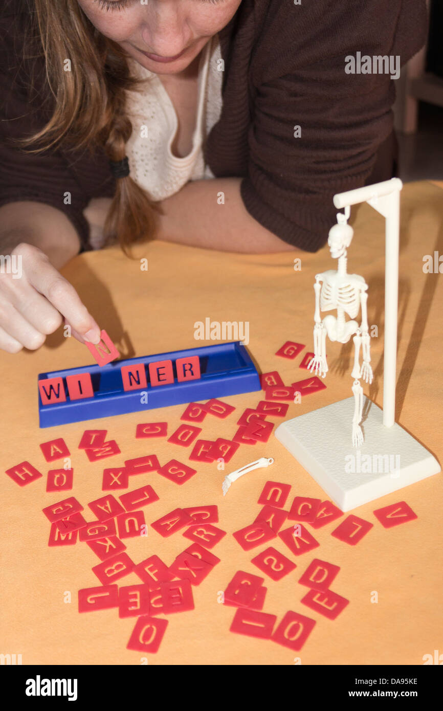 Woman playing board game hi-res stock photography and images - Alamy