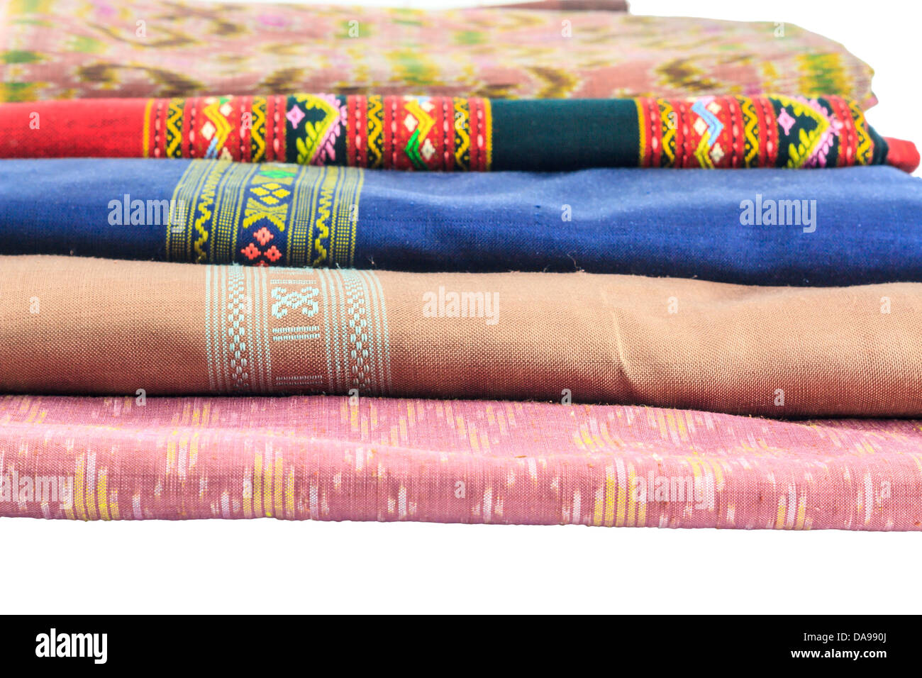 stack of Thai silk on white background Stock Photo - Alamy