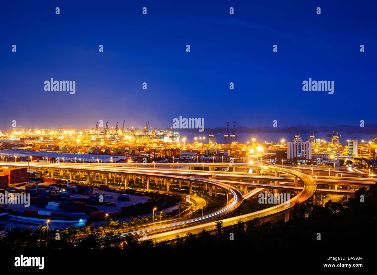 Freeway in night with cars light in modern city Stock Photo - Alamy
