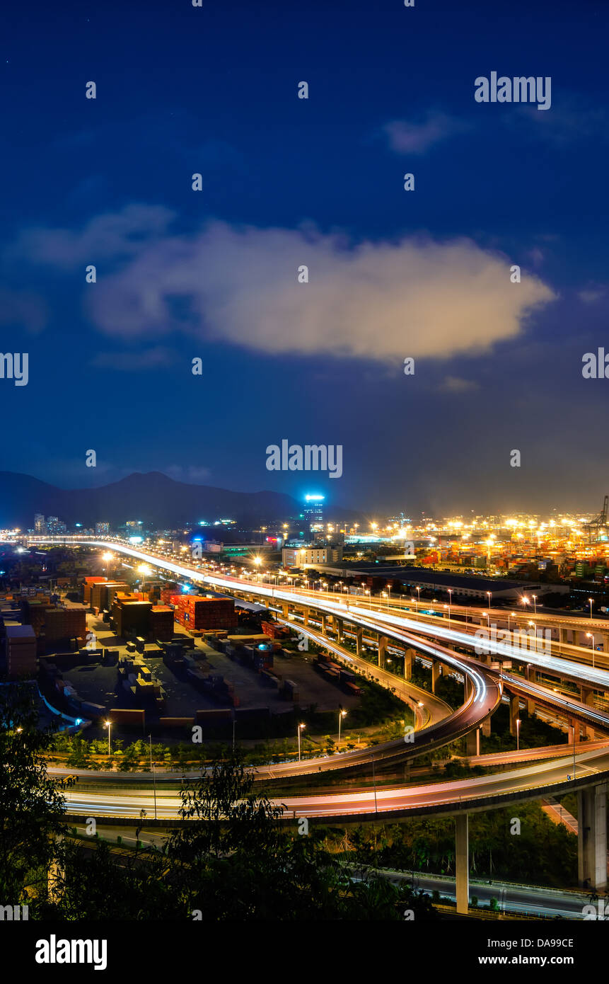 Freeway in night with cars light in modern city Stock Photo - Alamy
