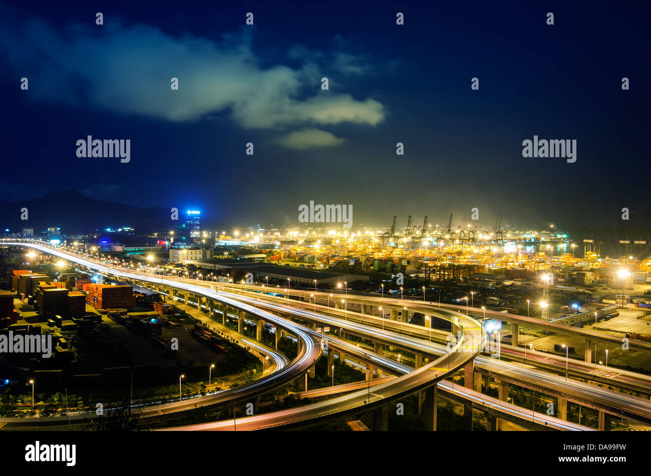 Freeway in night with cars light in modern city Stock Photo - Alamy