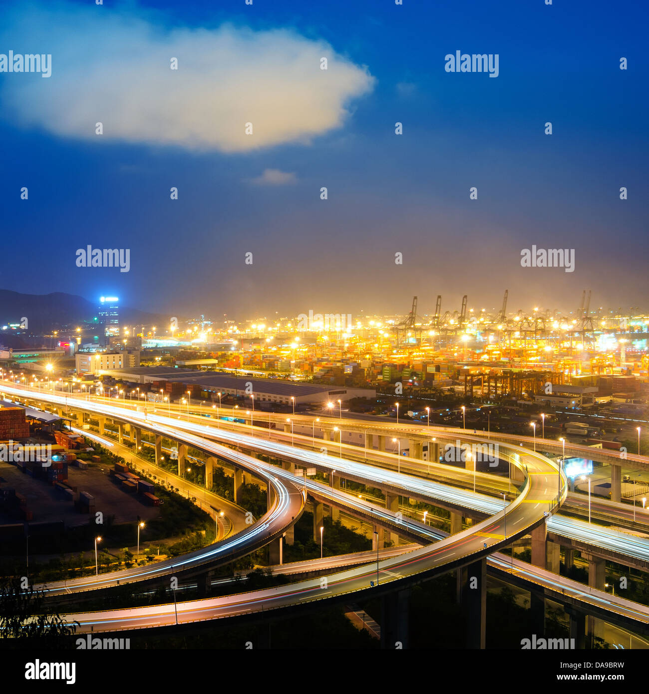 Freeway in night with cars light in modern city Stock Photo - Alamy