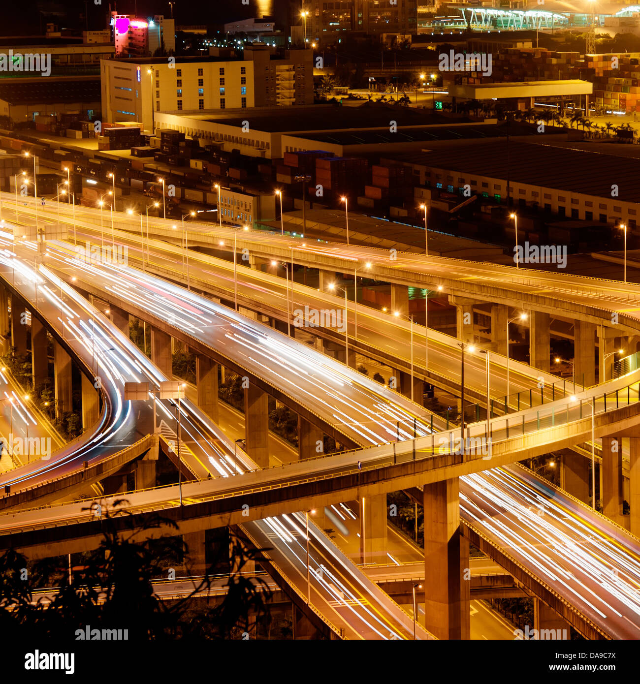 Freeway in night with cars light in modern city Stock Photo - Alamy