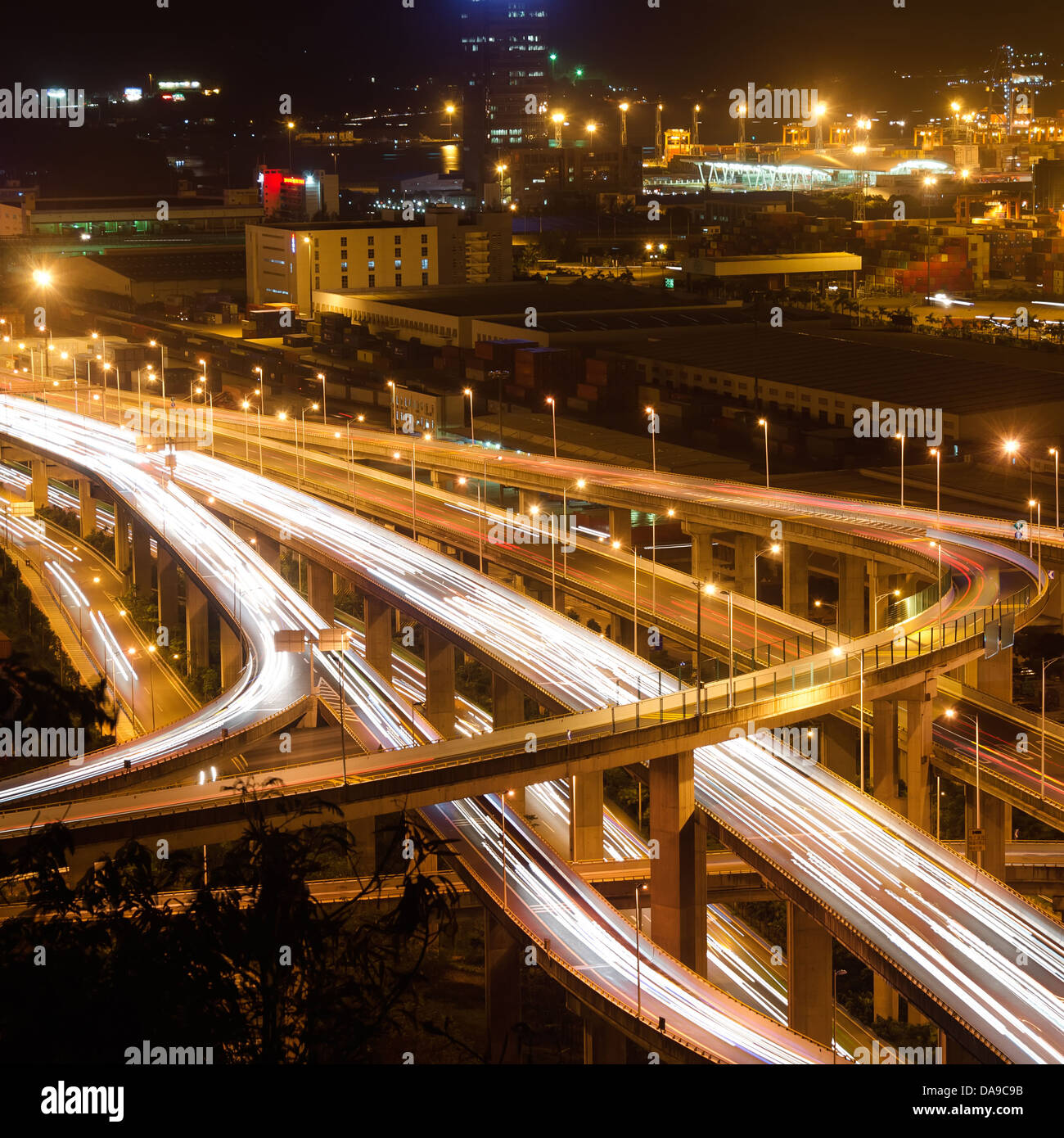 Freeway in night with cars light in modern city Stock Photo - Alamy