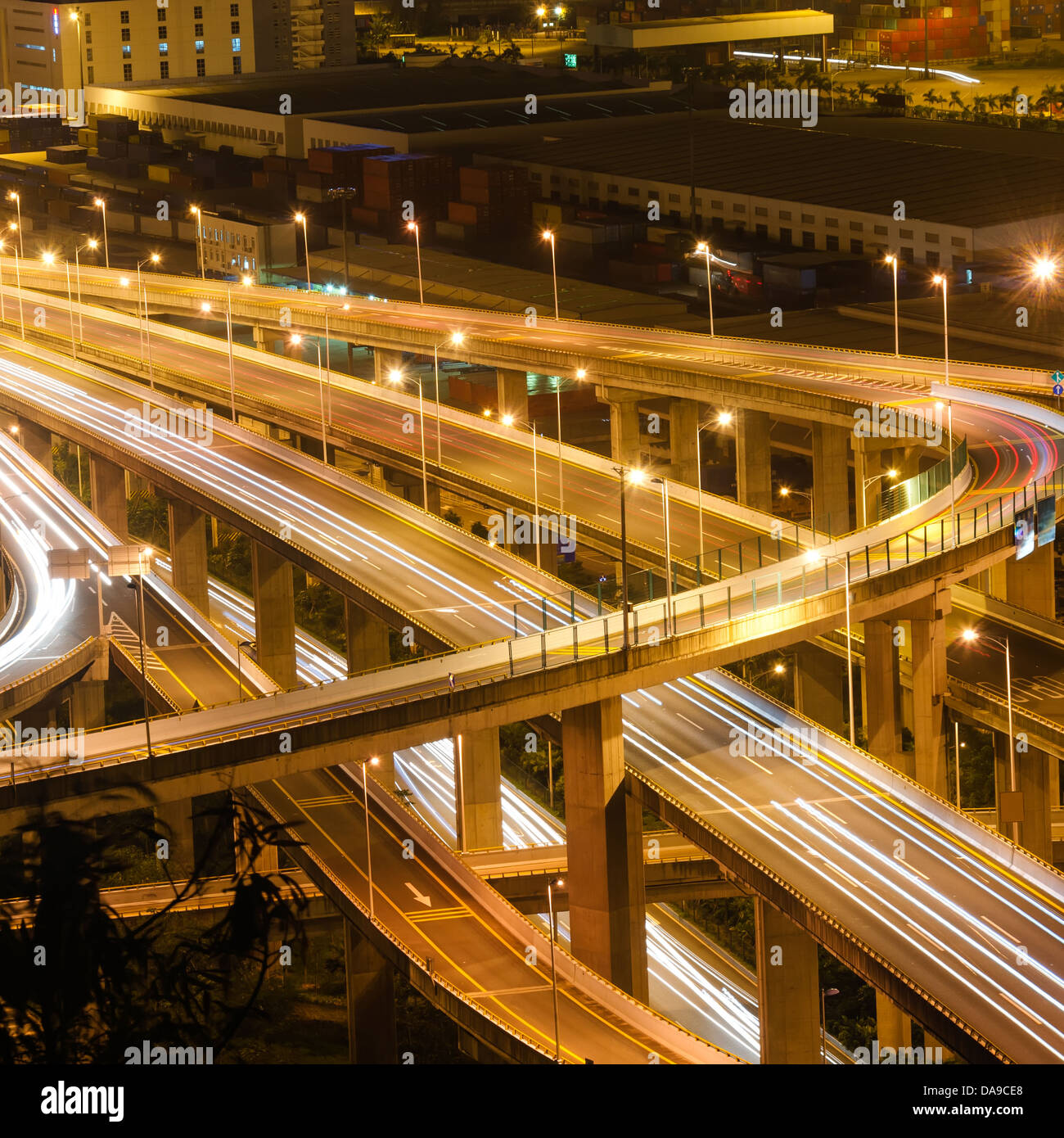 Freeway in night with cars light in modern city Stock Photo - Alamy