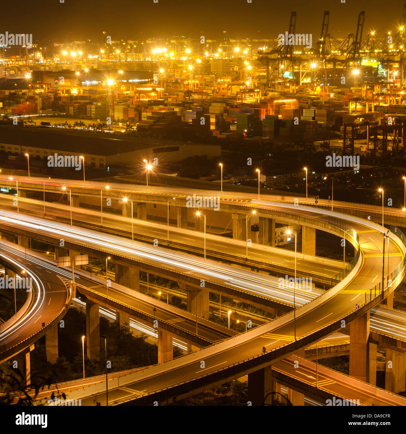 Freeway in night with cars light in modern city Stock Photo - Alamy