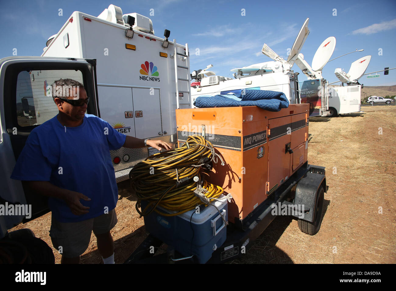 Prescott, AZ, USA. 8th July, 2013. Bobby Cruz of NBC Network sets up ...