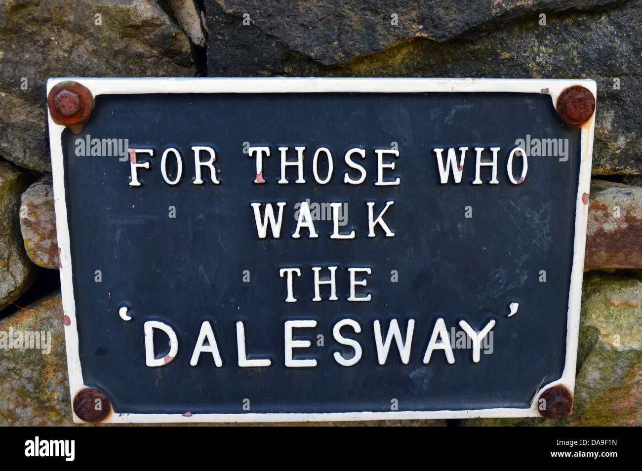Sign on stone seat at the start of the Dales Way Long Distance Footpath ...
