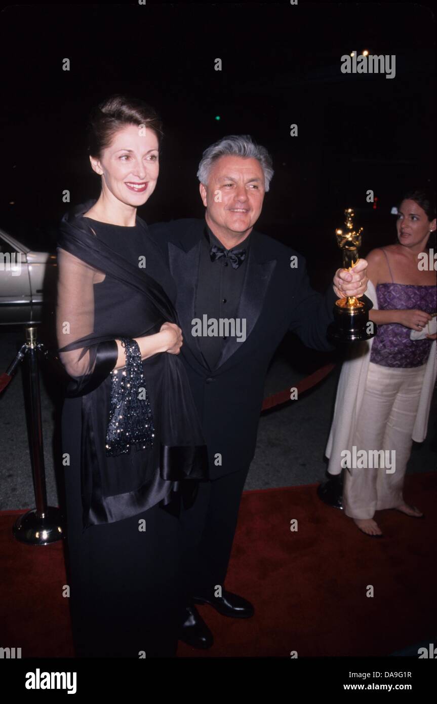 JOHN IRVING with wife.Miramax Oscar party at Beverly Hills Hotel , Ca ...