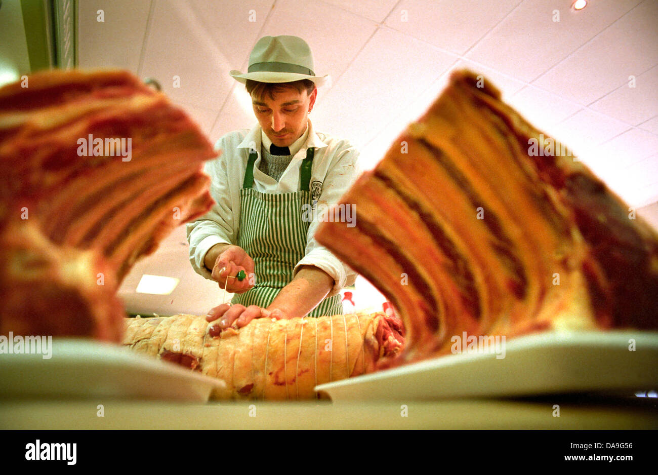 Butcher at work. Devon, UK Stock Photo - Alamy
