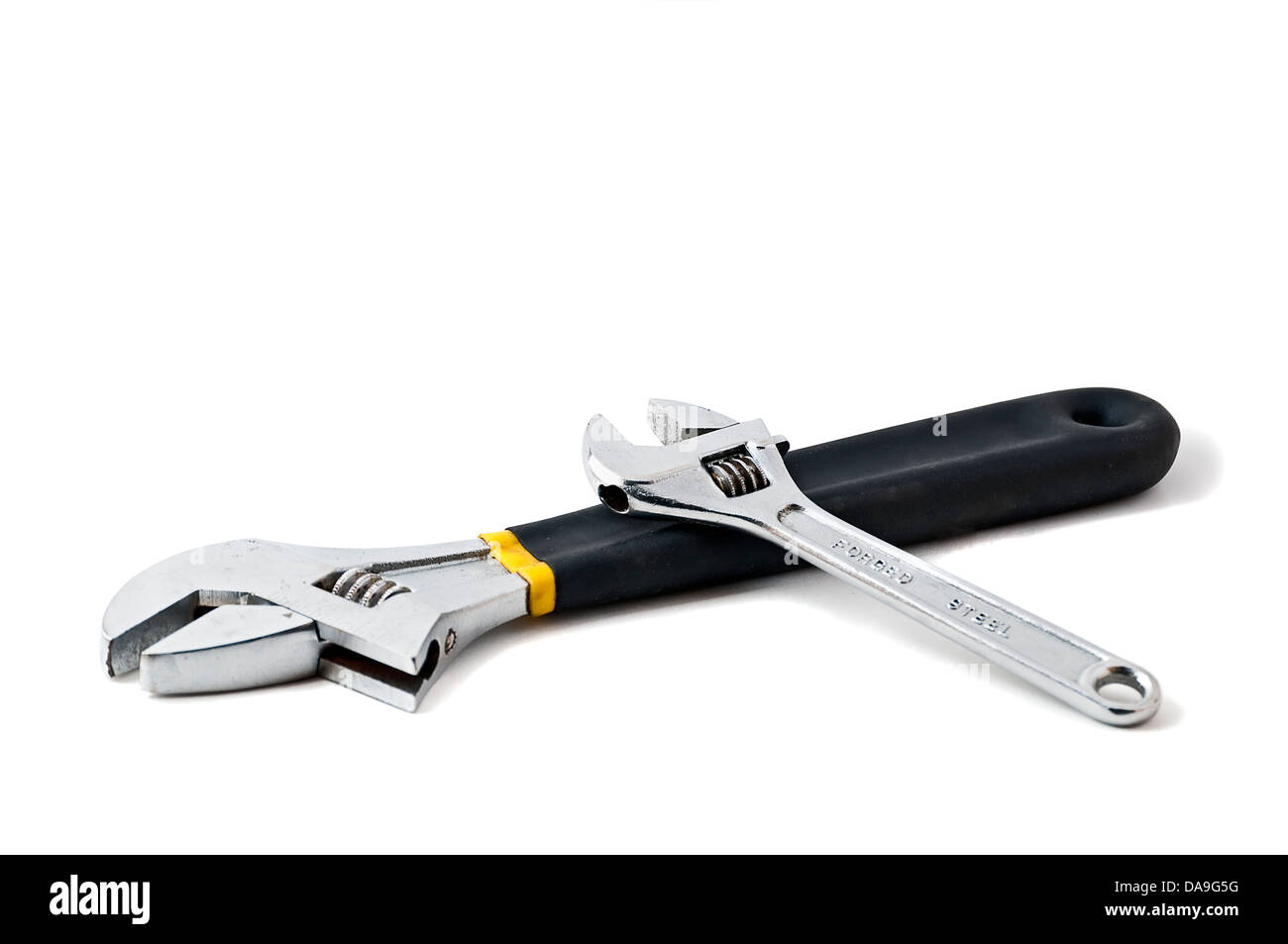 Two mechanics wrenches, both adjustable isolated on white background ...