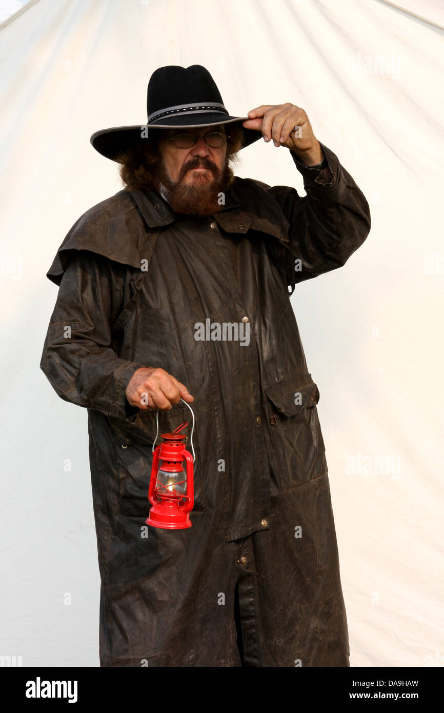 Cowboy holding lantern tent hi-res stock photography and images - Alamy