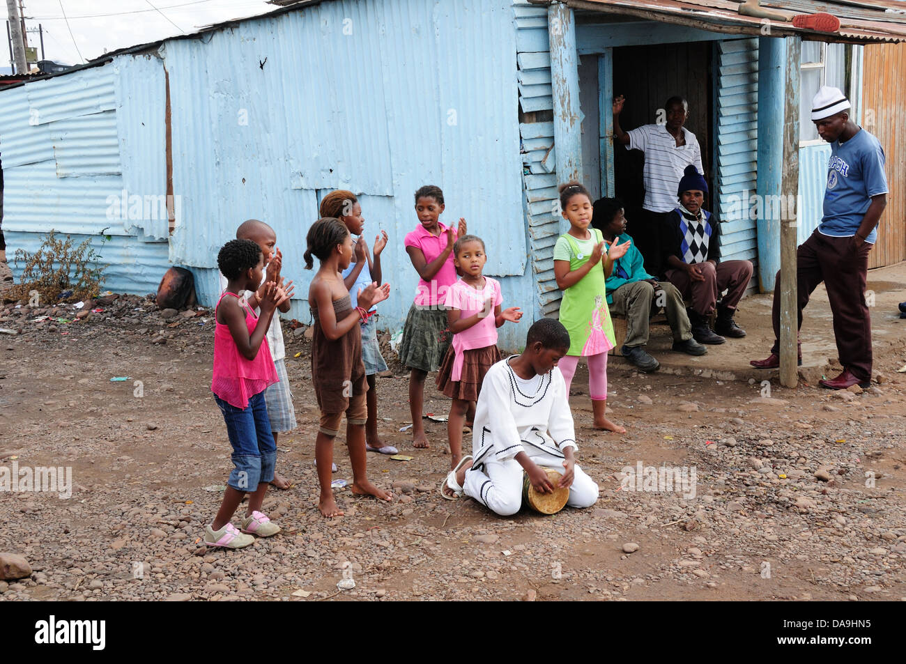 Children boys girls dancing a traditional dance and a boy young man ...