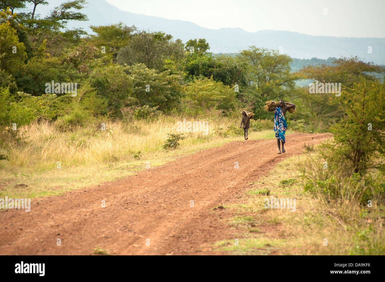 Suri (Surma) people on a dirt road, Ethiopia Stock Photo - Alamy
