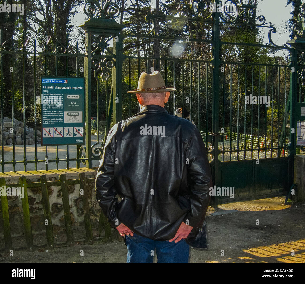 Paris, France, Man Reading Sign in Bois de VIncennes, Abandoned SIte of ...
