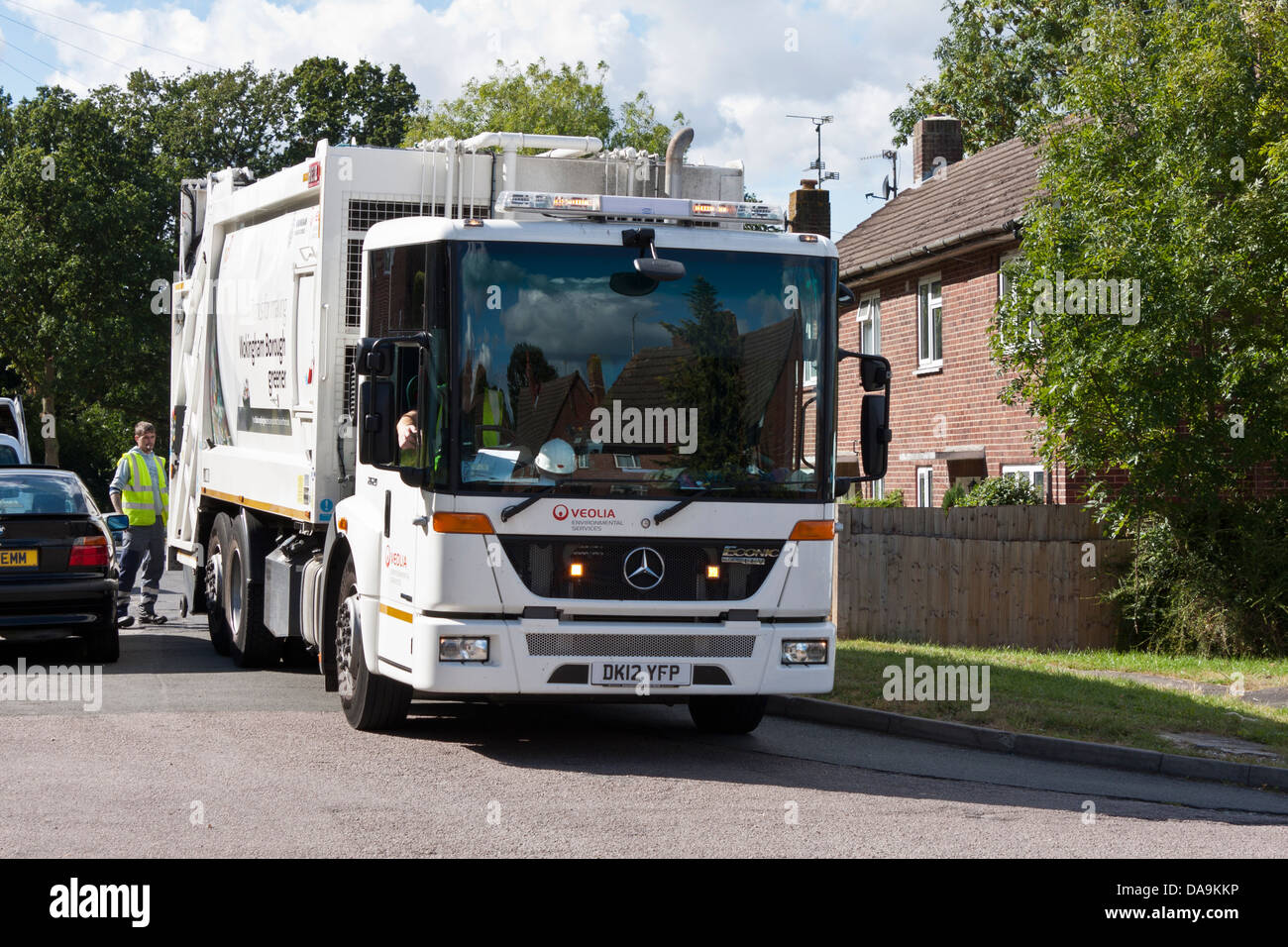 Workers collecting waste for recycling Stock Photo - Alamy