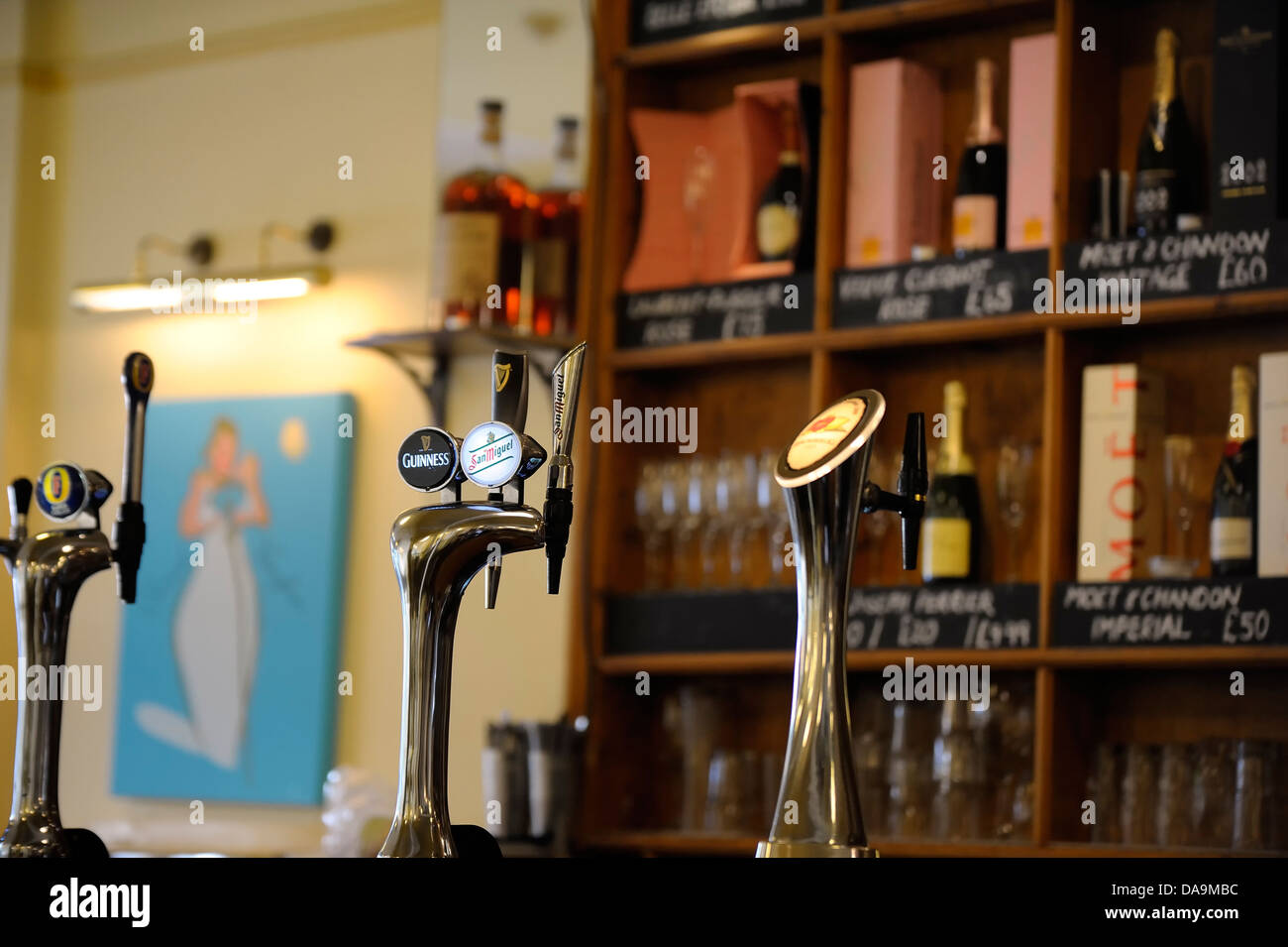 Guinness san miguel beer pumps hi-res stock photography and images - Alamy