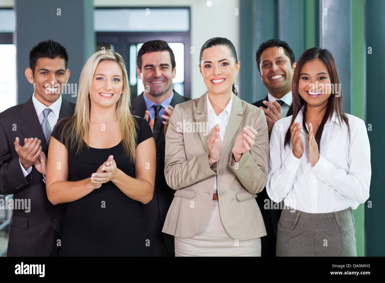 Multicultural group work smiling hi-res stock photography and images ...