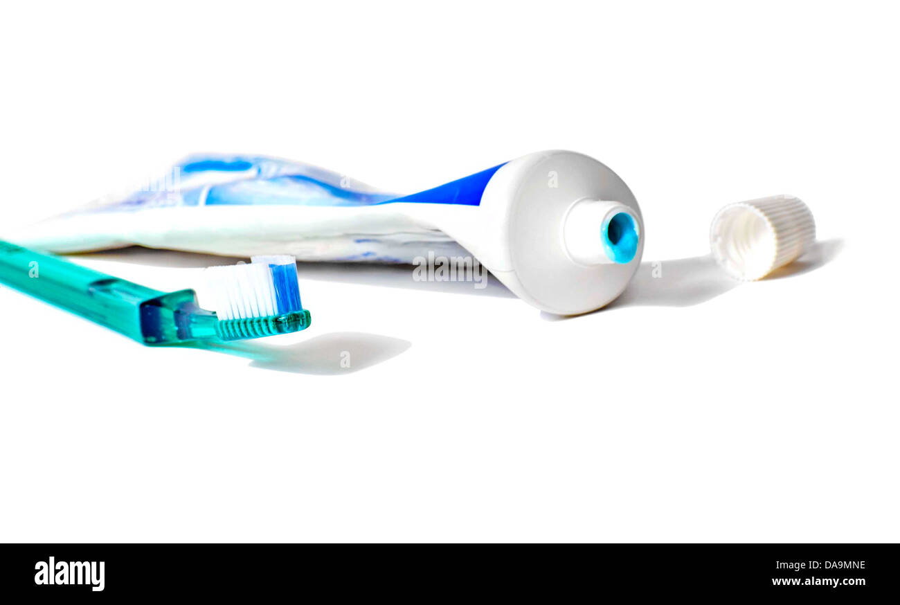 toothpaste and brush isolated against a white background Stock Photo ...