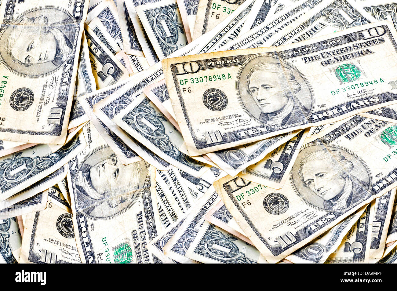 Loose pile of American money of various denominations Stock Photo - Alamy