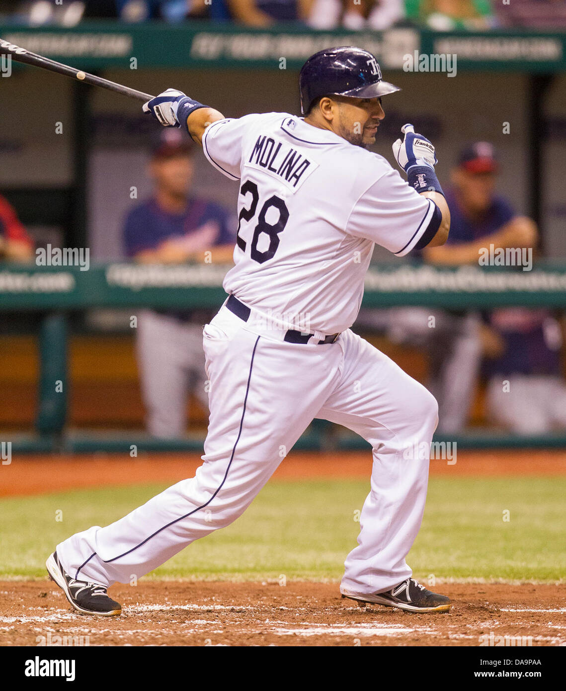 St. Petersburg, Florida, USA. 8th July, 2013. Jose Molina hits a RBI ...