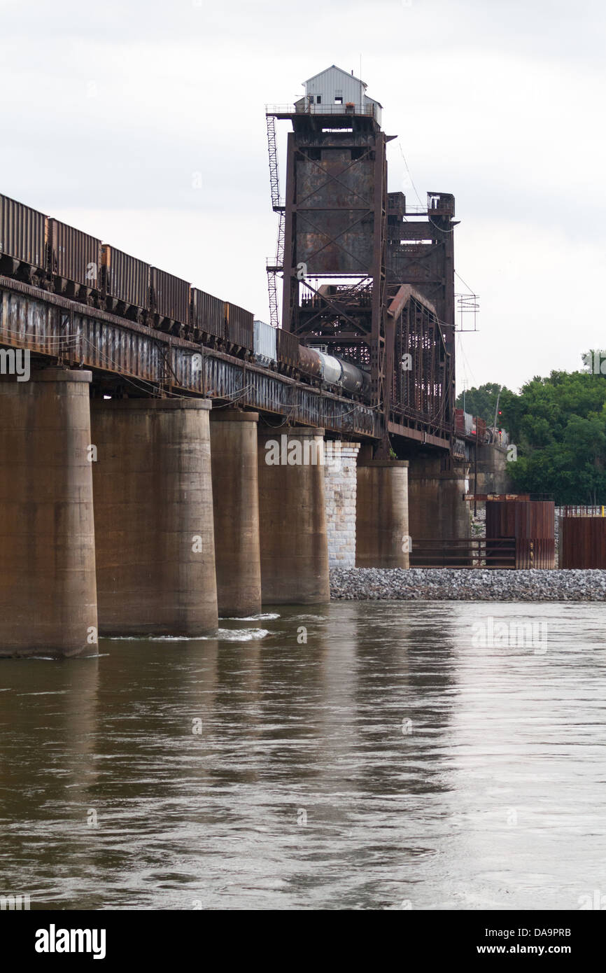 A train crosses the Tennessee River on a railroad bridge below the ...