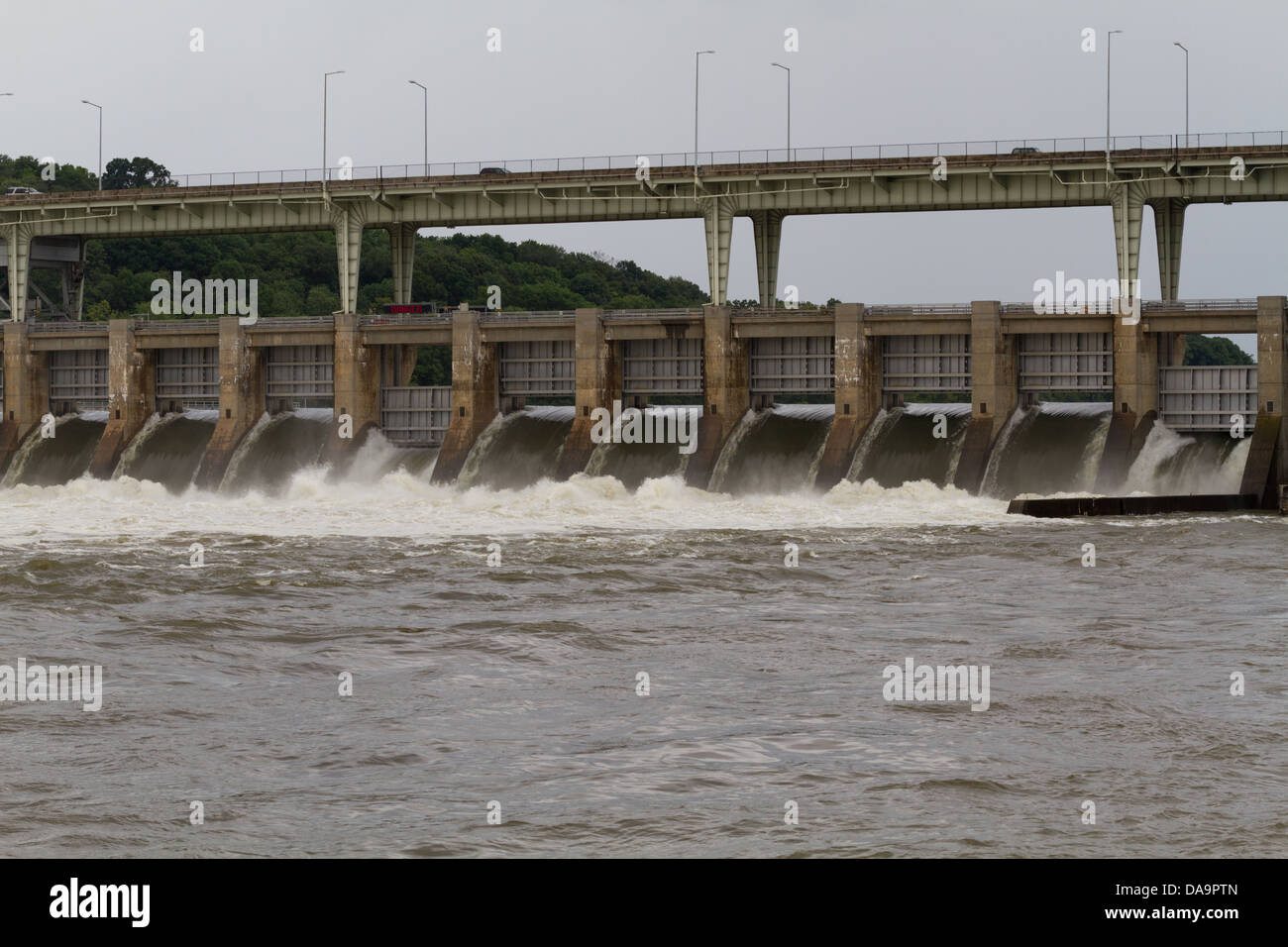 The Chickamauga Dam (floodgates open) with the Tennessee River at flood ...