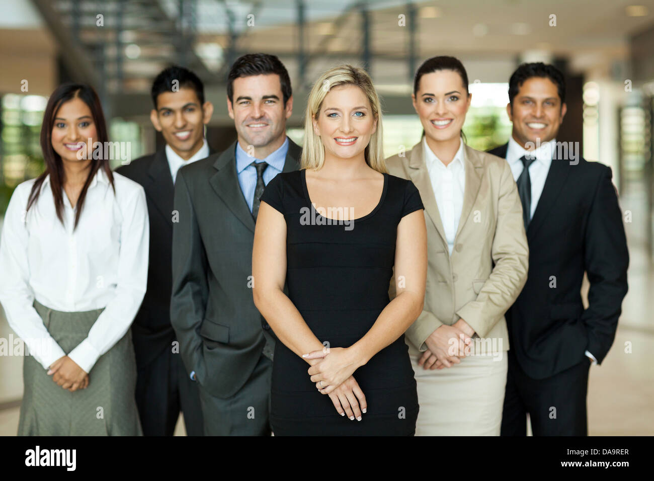portrait of modern business team inside office building Stock Photo - Alamy
