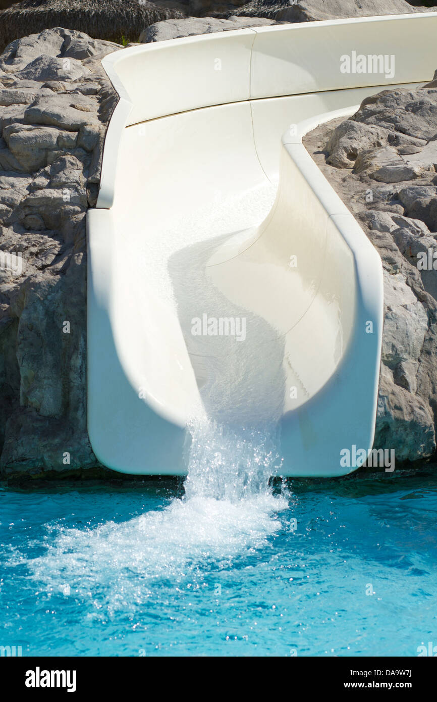 Empty slides with clean water at some unrecognizable resort with lots ...