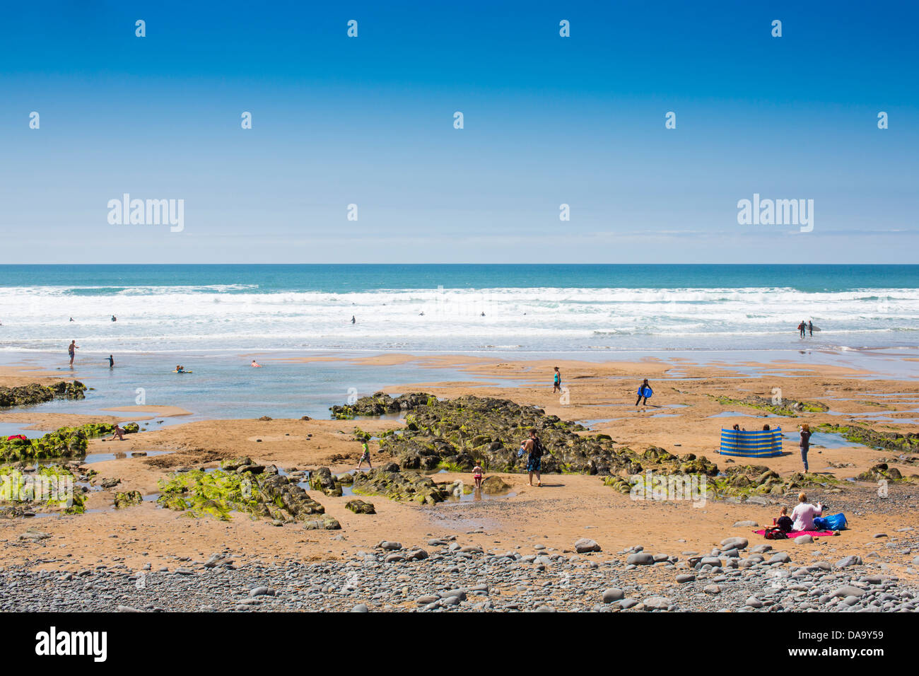 People relax on the beach at Sandymouth Bay, north Devon, England Stock ...