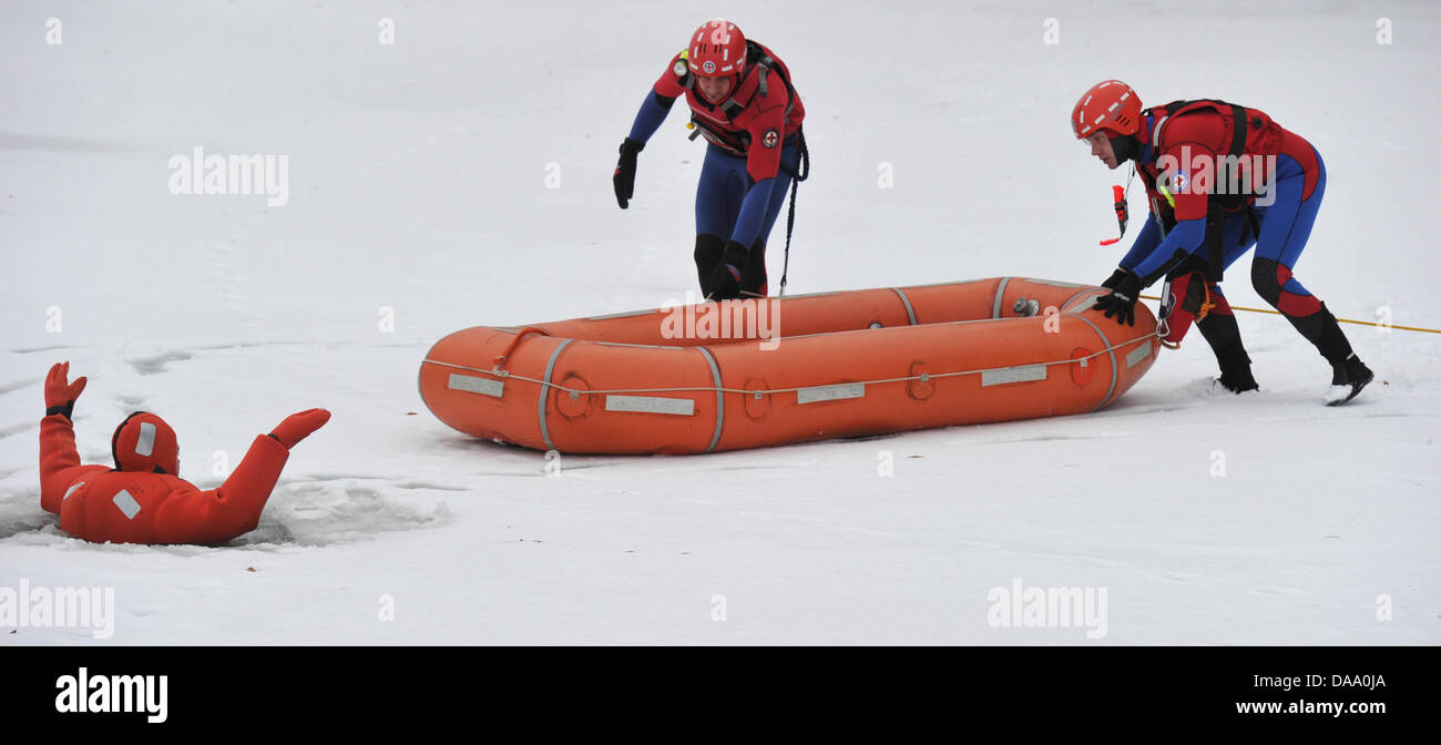 Members of the German Red Cross Water Rescue service perform a rescue ...