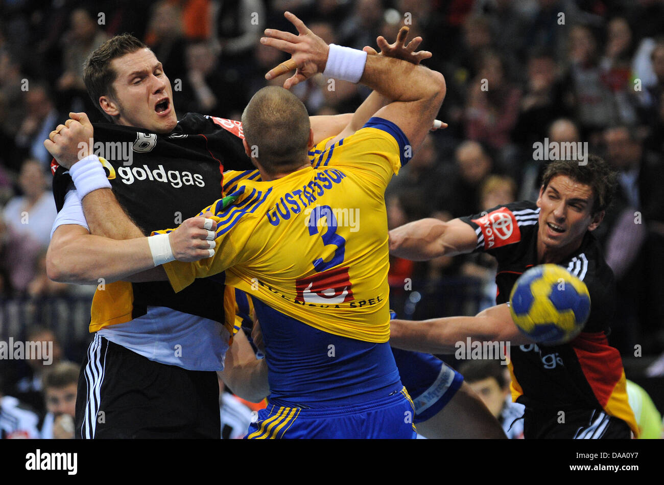Germany's players Sebastian Preiss (L) and Adrian Pfahl (R) fight for ...