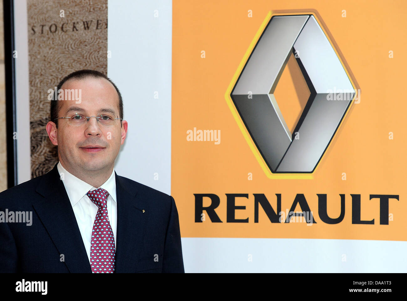 The CEO of Renault Germany Achim Schaible stands in from of a logo in ...