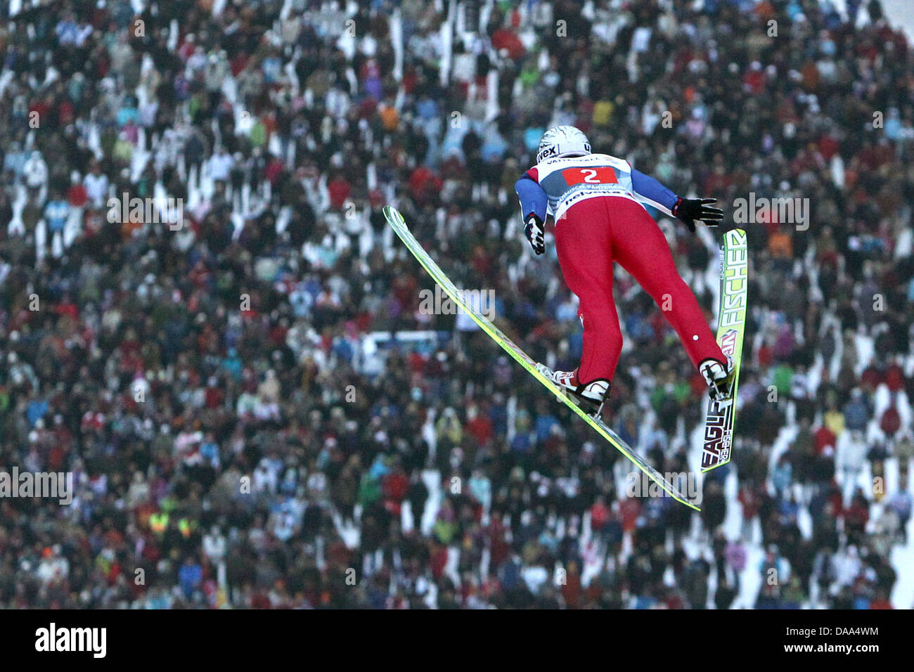 Norwegian ski jumper Anders Jacobsen jumps in the Four Hills Tournament ...