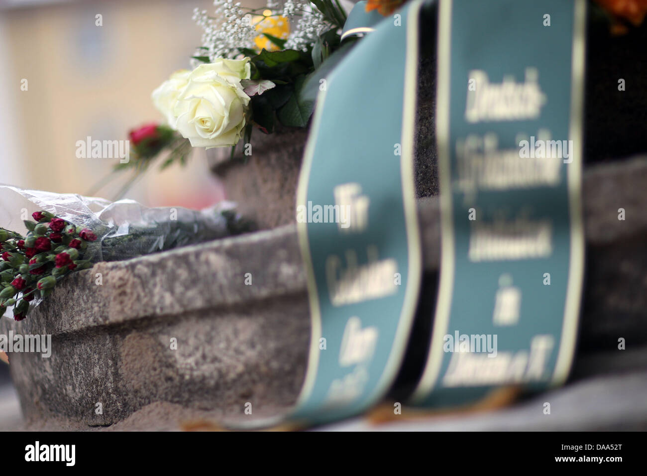 A wreath commemorates Oury Jalloh who was killed during a fire in a ...