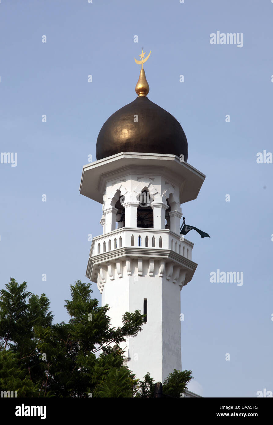 It's a photo of a minaret of a mosque with a speaker for the call to ...