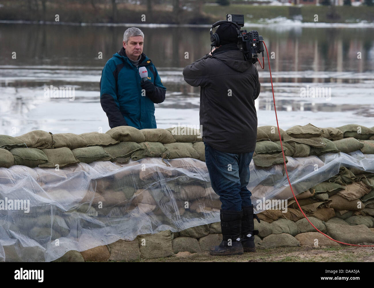 Weather Reporter Flood High Resolution Stock Photography and Images - Alamy
