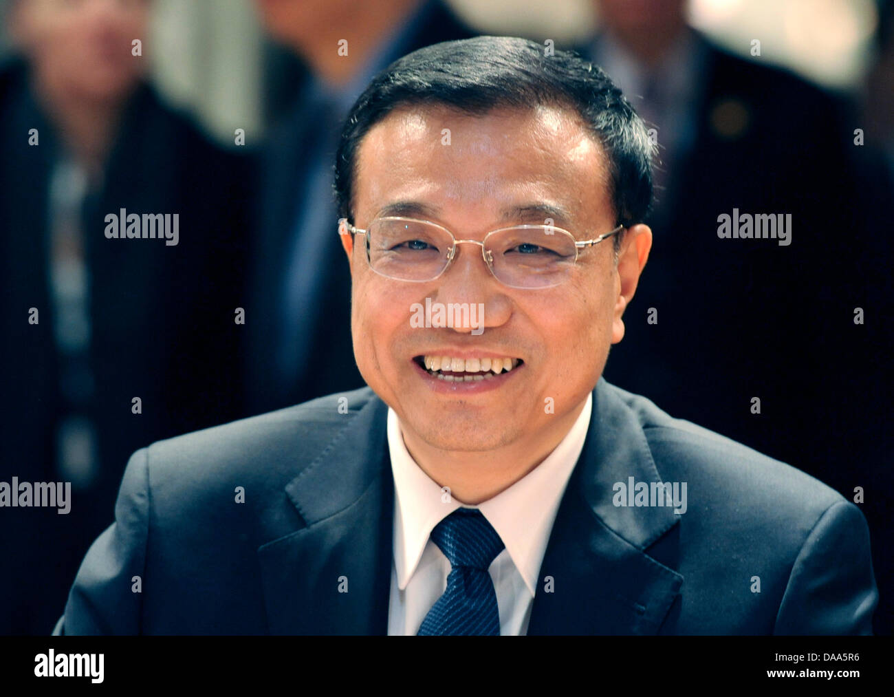 Chinese Vice-Prime Minister Li Keqiang smiles during his visit to the ...